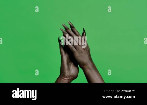 Scary hand showing gestures in studio. Creepy halloween devil monster ...