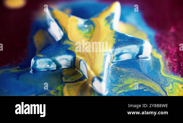 Paint star. Glitter liquid spill. Blue yellow color shimmering ink mix ...