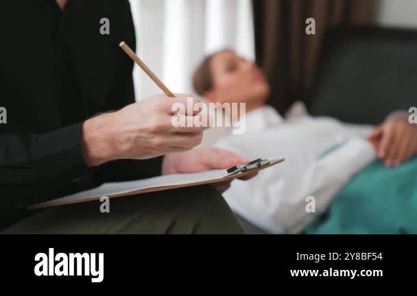 Young female patient lying on crouch release emotion from traumatic ...