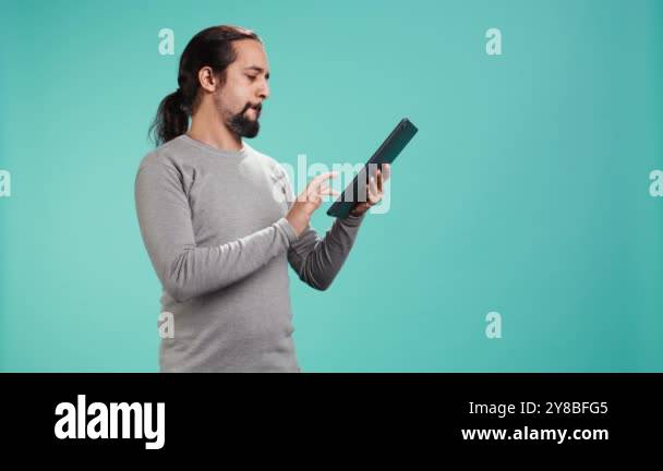 Jolly man excited to greet friends during teleconference meeting using ...