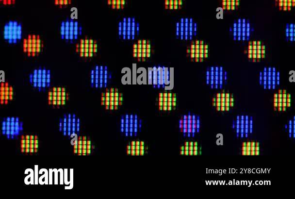Extreme macro view of 4K LED matrix red, blue, and green sub-pixels ...