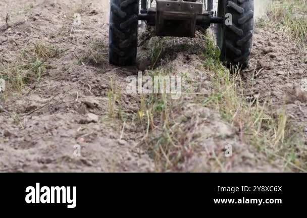 Close-up of potato digger on walk-behind tractor. Harvesting potatoes ...
