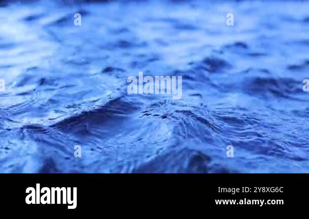 Natural background of blue water surface of sea or ocean with waves and ...