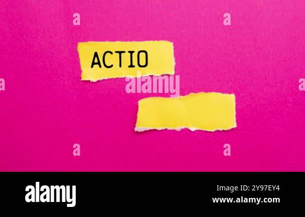 Action plan message writing on ripped torn yellow paper pieces on pink background. Conceptual ...