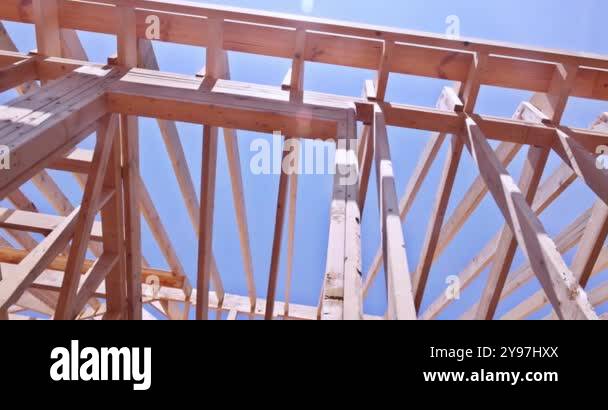 Installation of timber roofing truss frames by building under ...