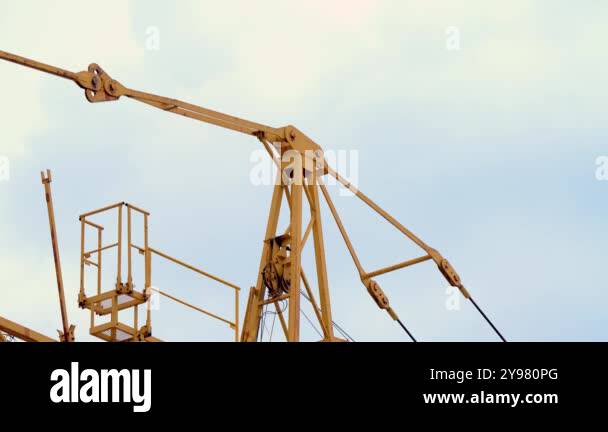 Dynamic scene construction crane in action. Huge professional ...