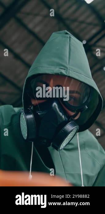 Portrait of a woman in safety suit and gas mask. Human wearing ...