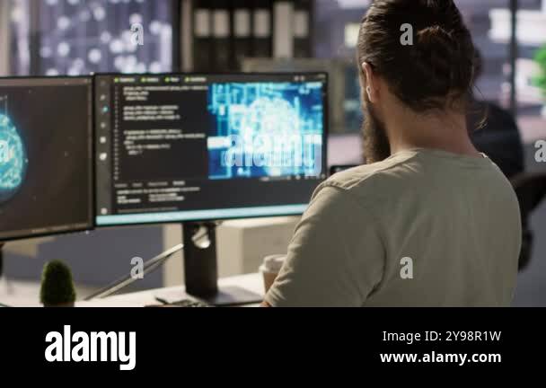 Software technician using computer for artificial intelligence computing simulating human brain ...