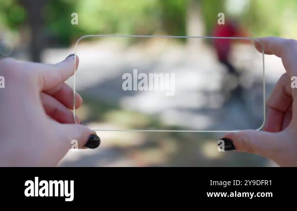 Person holding transparent gadget. Female hands hold innovative ...