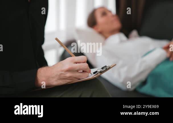 Young female patient lying on crouch release emotion from traumatic ...