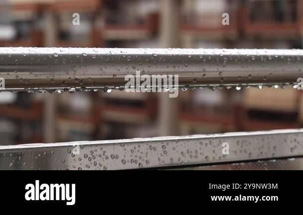 Balcony railings in the rain, selective focus. Close-up of balcony ...