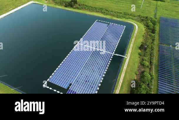 View from above of floating photovoltaic power plant with many rows of ...