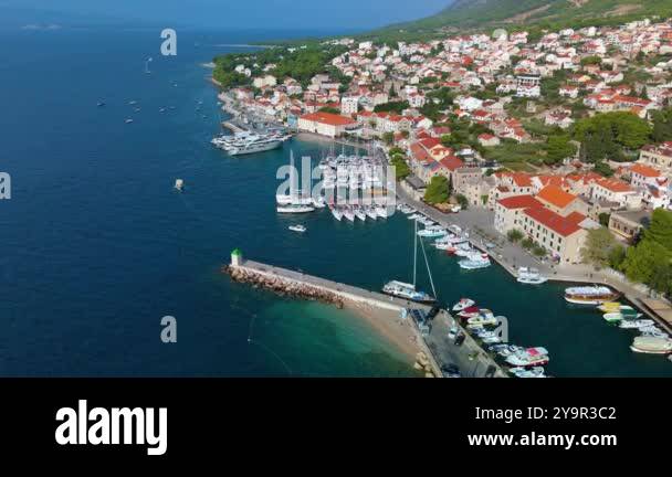 Take in the stunning aerial view of the beautiful Supetar Harbour ...