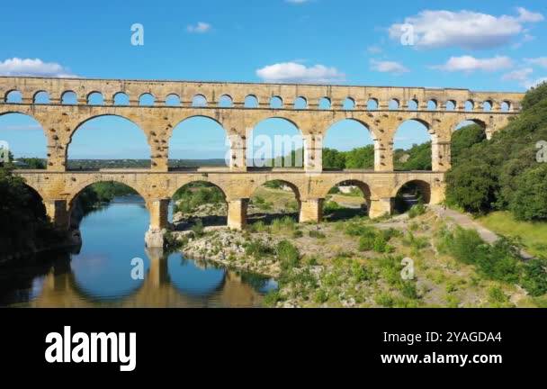 Exploring the majestic Pont du Gard aqueduct in France, discover the ...