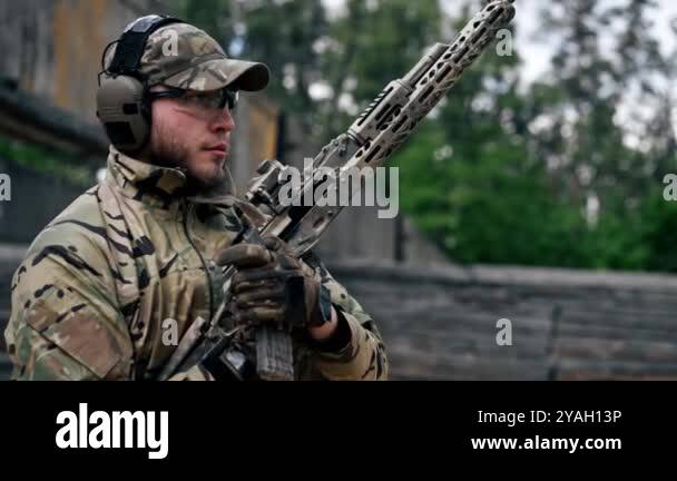 close up vertical video military tactical strategy aiming from NATO ...