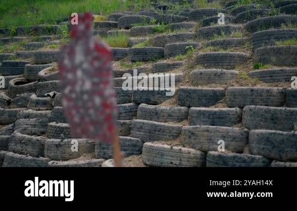 close up at a professional shooting range, sandy ground, wall of ...