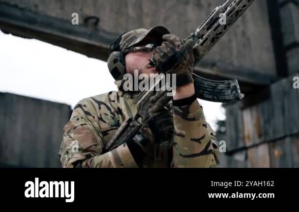 close up military tactical strategy aiming from NATO rifle training at ...