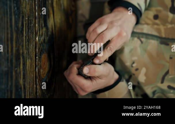 vertical video close-up at a professional shooting range a military ...