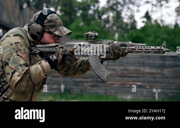 close up vertical video military tactical strategy aiming from NATO ...