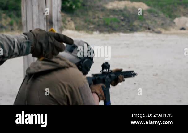 close up military tactical strategy aiming from NATO rifle training at ...