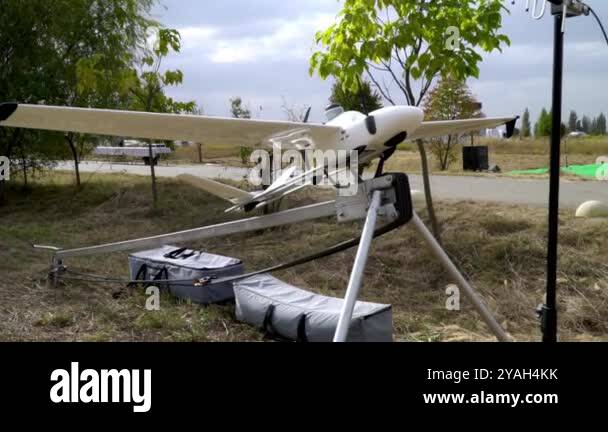A modern reconnaissance UAV with long wings on a launcher at an ...