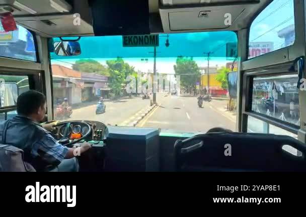 Traveling with a short hop intercity bus in Asia front seat view ...