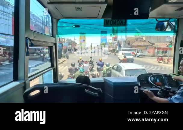 Traveling with a short hop intercity bus in Asia front seat view ...