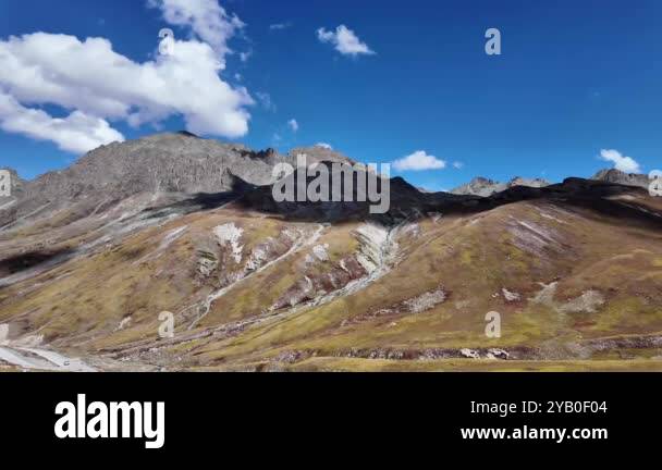 4K Mountain Landscape Side View of a Concrete Road Winding Upward ...