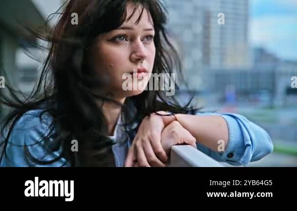 Worried nervous crying young woman, outdoor modern city background. Sad ...