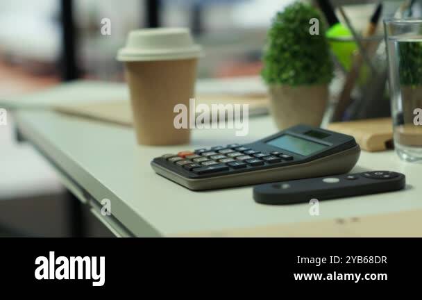 In a professional boardroom, computer screen showcases business data ...