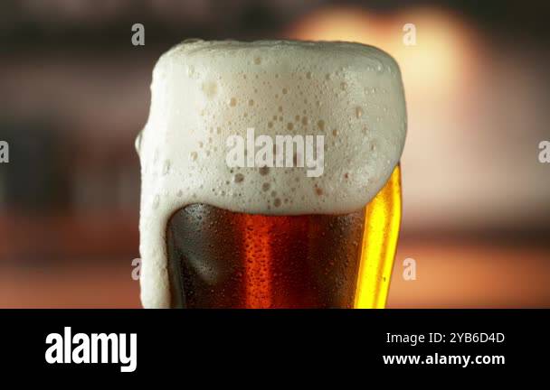 Super Slow Motion of Overflowing Foam from Beer Pint. Filmed on High ...