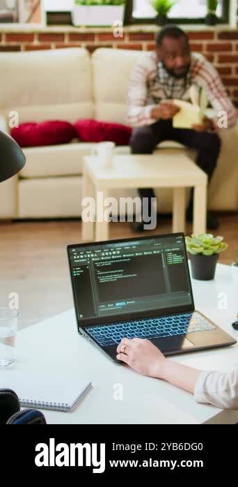 Vertical Video Software Developer Types Programming Code In A Cozy Home