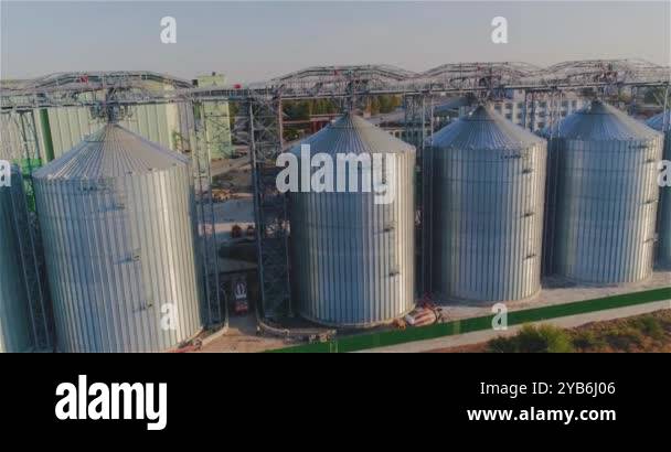 Heavy Duty Hopper Bins. Grain storage and grain handling. Drone aerial view Stock Video Footage ...