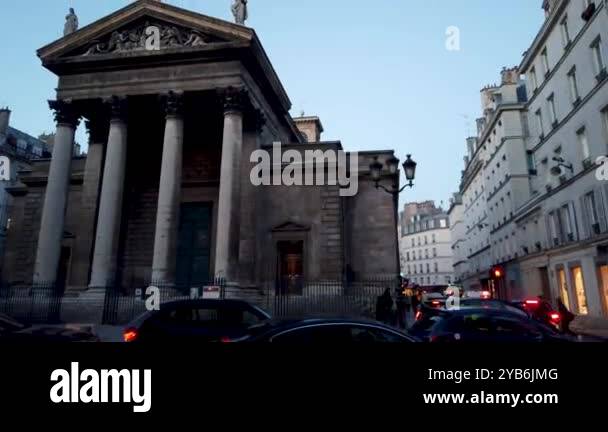 A video of a neoclassical church building located on a busy Parisian ...