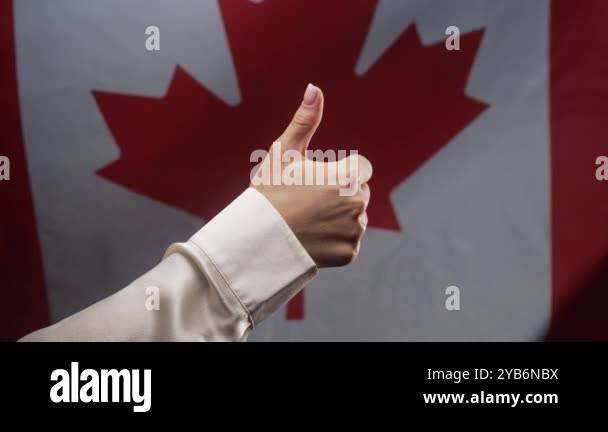 Woman Makes Hand Sign Like, Thumb Up Gesture on canadian flag ...