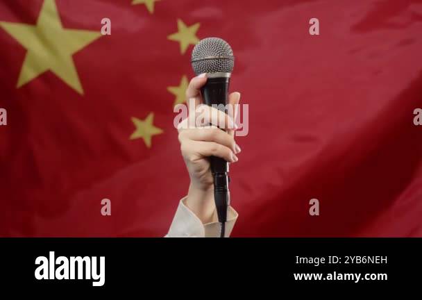 Woman reporter or journalist holding mic, mike or microphone in hand ...