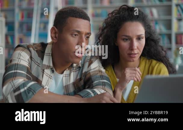 Unhappy Indian Hispanic woman African American man classmates students ...