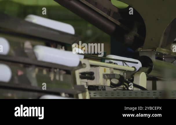 Plastic container production line. Factory transporting line is ...