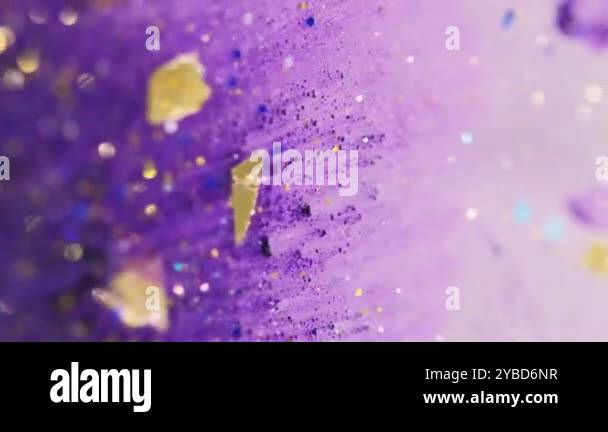 Shimmering paint. Liquid glitter flow. Defocused purple color shiny ...