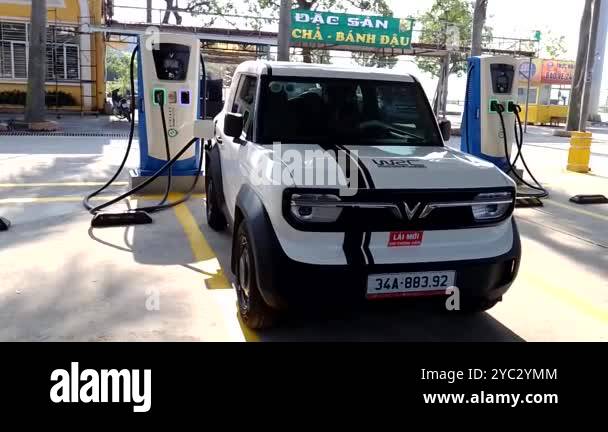 Vinfast electric cars are on the road and are charging. VinFasts design ...