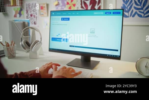 Close up of man typing text prompt in AI video generator on computer ...