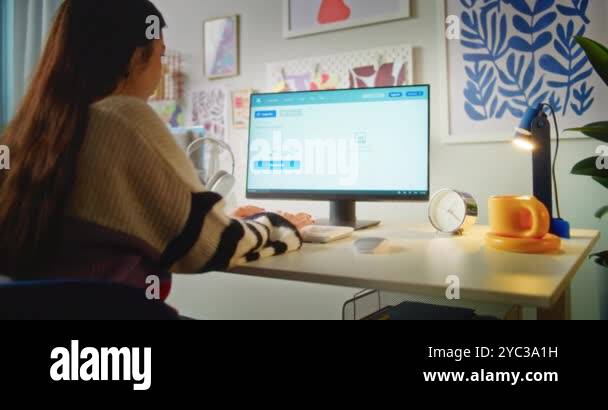 Back view of girl typing prompt in AI image generator on PC. Artificial ...