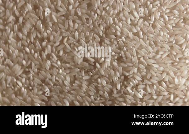 Dry Uncooked White Rice Background Slowly Rotating Right - Top View ...