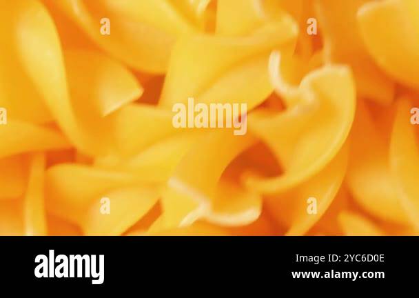 Uncooked Fusilli Pasta with Spiral Form - Moving Background, Top View ...