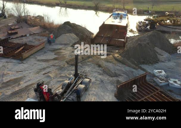 Above view excavator and tow truck together they are pull out part of ...
