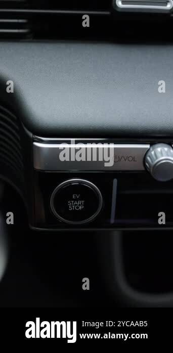 Vertical video of start stop Button to start keyless car electro engine ...