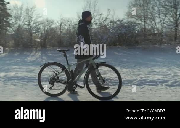 Man walking bike through snow Stock Videos & Footage - HD and 4K Video ...