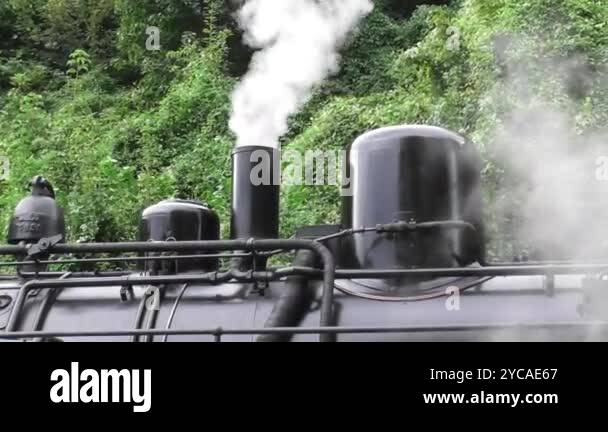 steam steam locomotive with steam and smoke on top Stock Video Footage ...