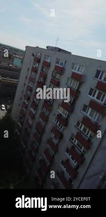 The video starts with a view of a city from above. The camera then ...