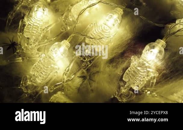 Transparent skeletons glowing yellow, close-up. Transform your space ...